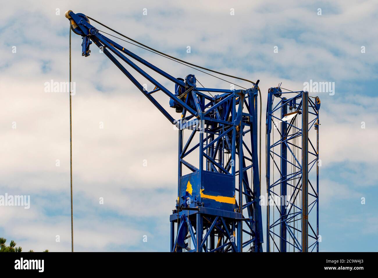 Folded construction crane hi-res stock photography and images - Alamy