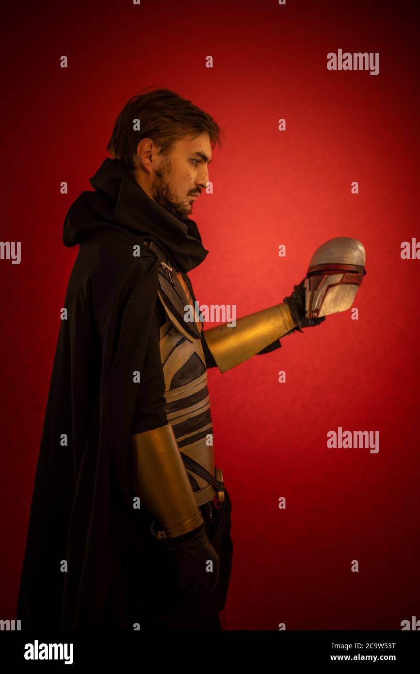 Actor a man in a mask and in costumes of fictional fantasy characters ...