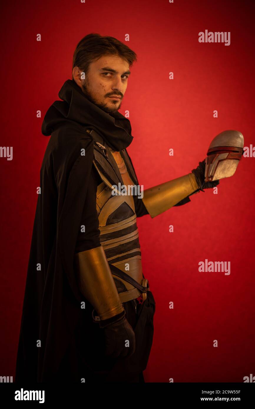 Actor a man in a mask and in costumes of fictional fantasy characters ...