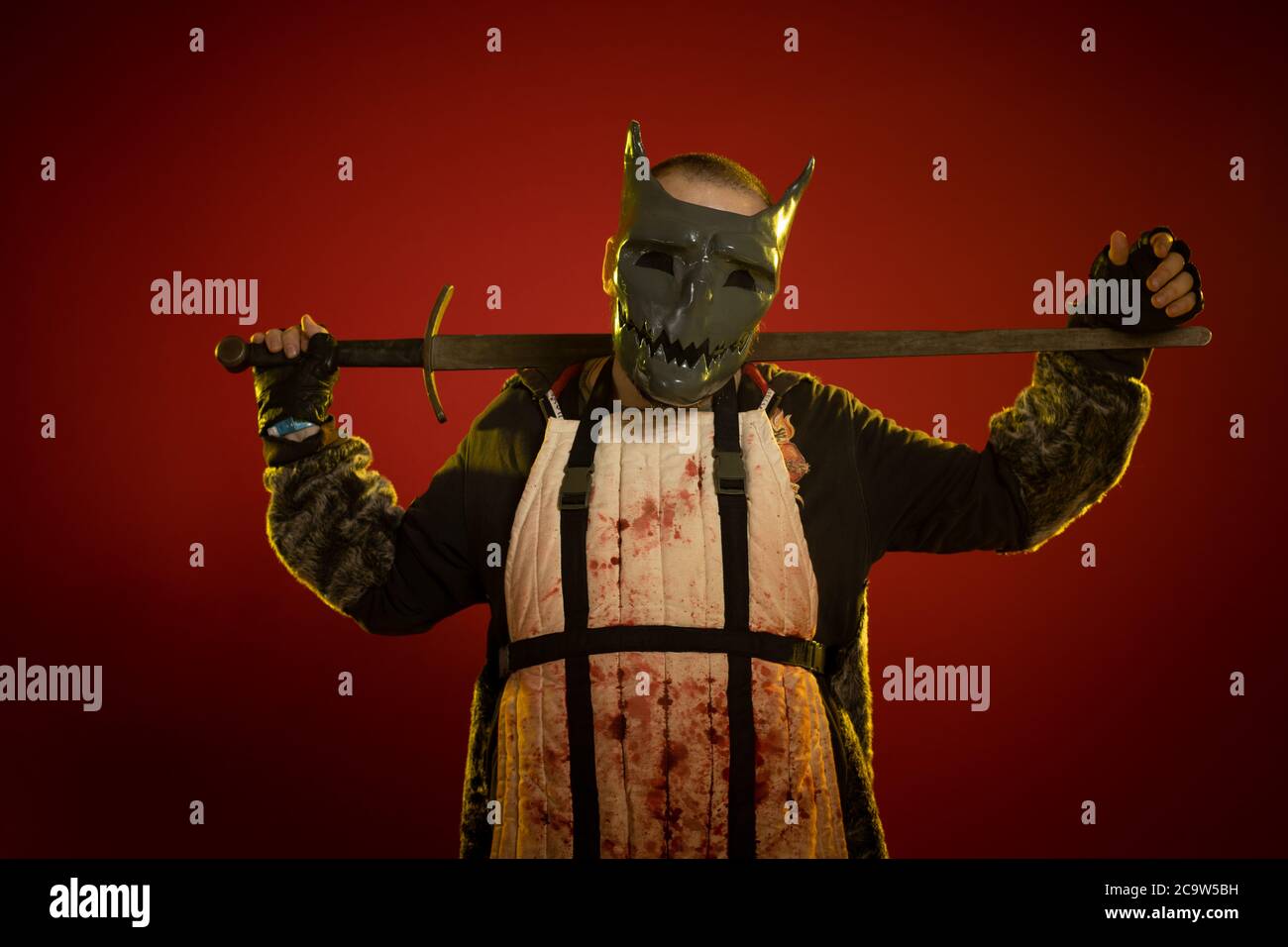 Actor a man in a mask and in costumes of fictional fantasy characters ...