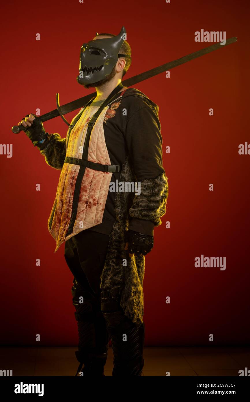Actor a man in a mask and in costumes of fictional fantasy characters ...