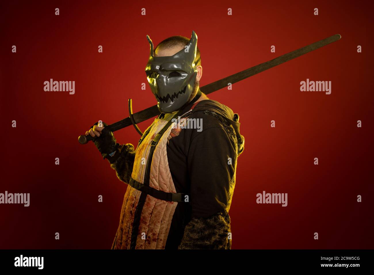 Actor a man in a mask and in costumes of fictional fantasy characters ...