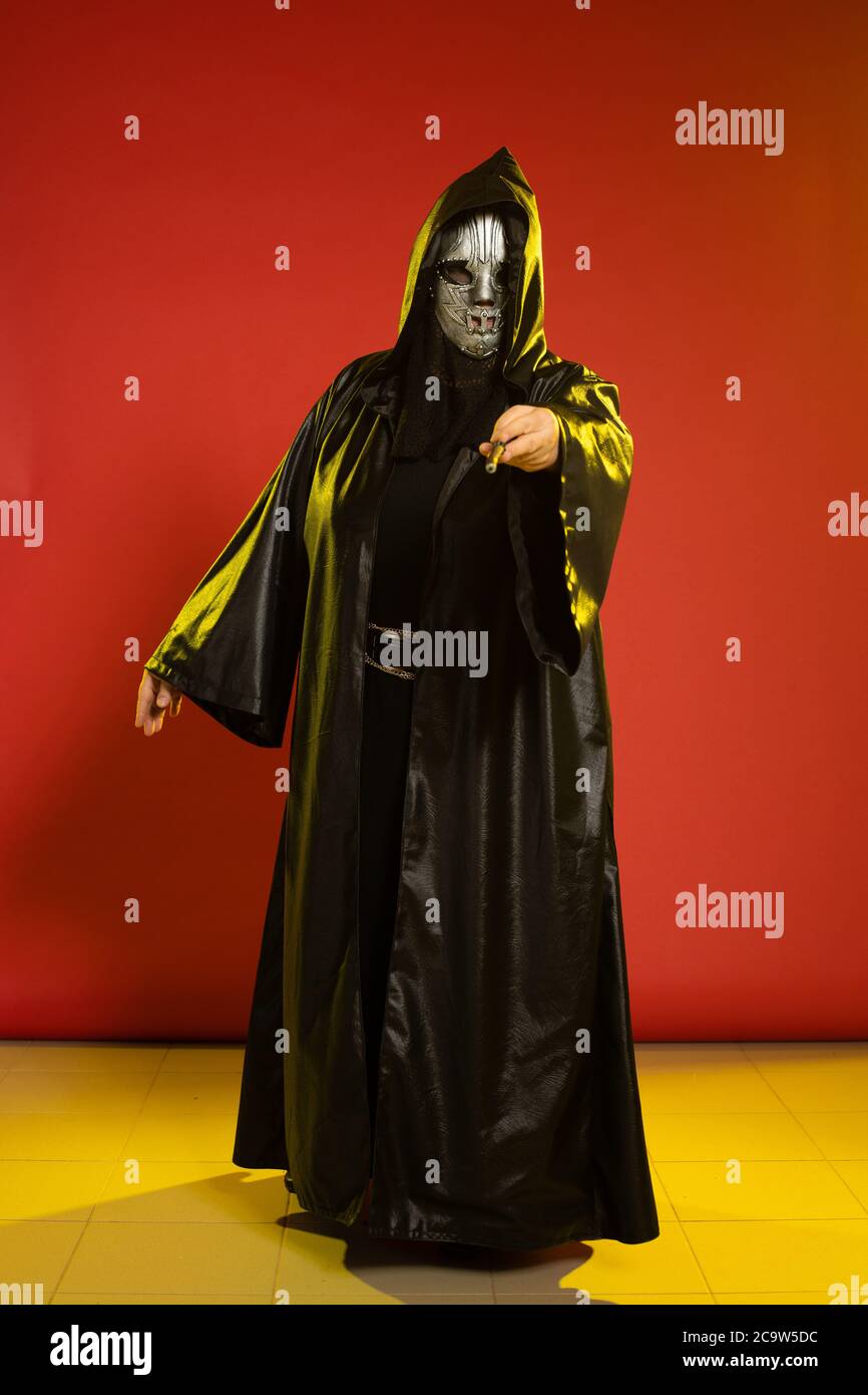 Actor a man in a mask and in costumes of fictional fantasy characters ...