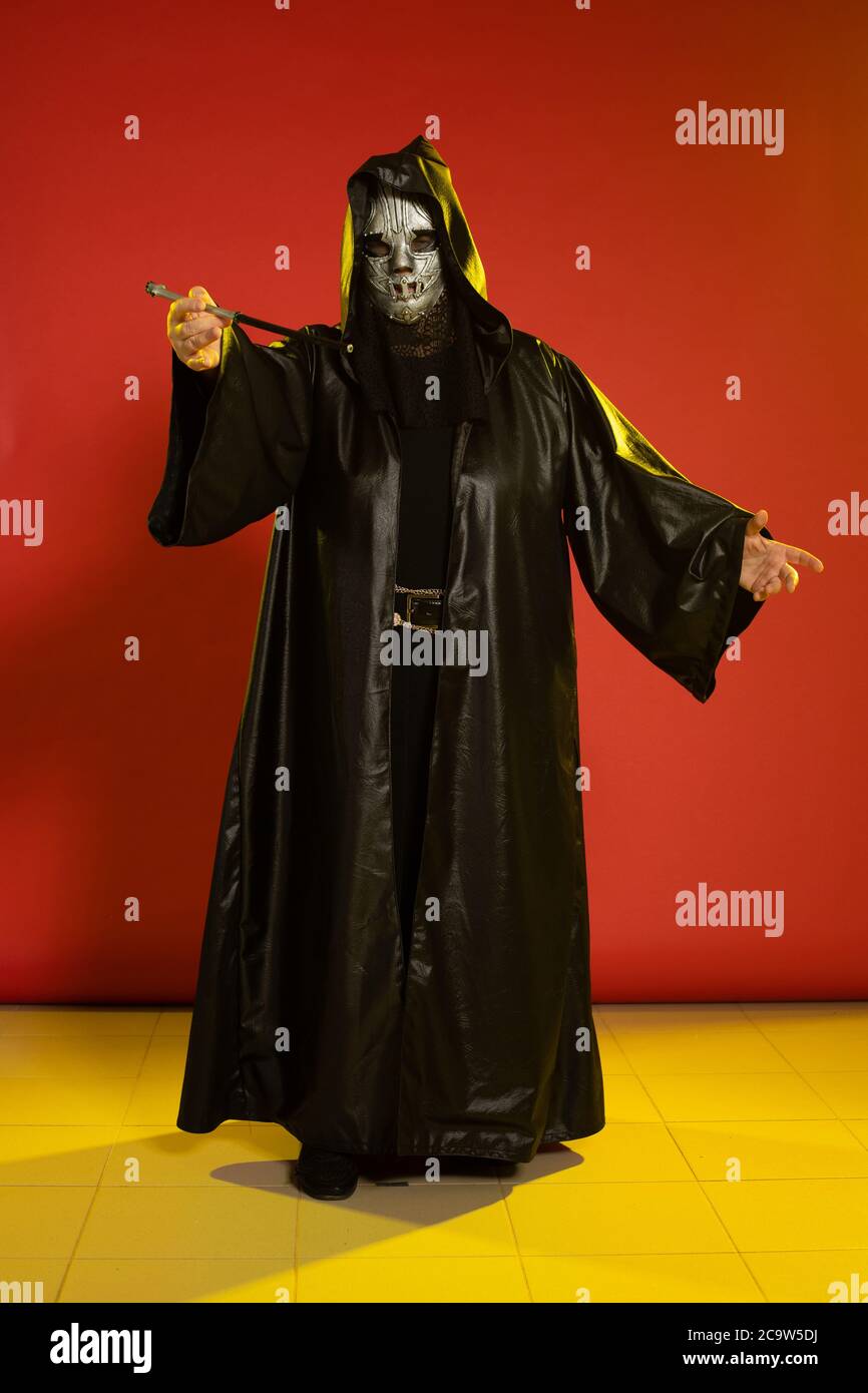 Actor a man in a mask and in costumes of fictional fantasy characters ...