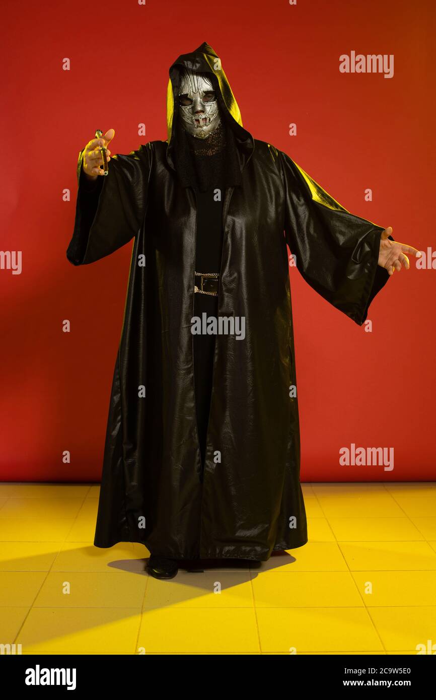 Actor a man in a mask and in costumes of fictional fantasy characters ...