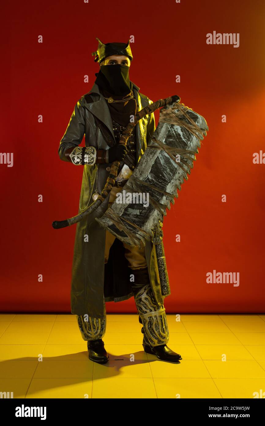 Actor a man in a mask and in costumes of fictional fantasy characters ...