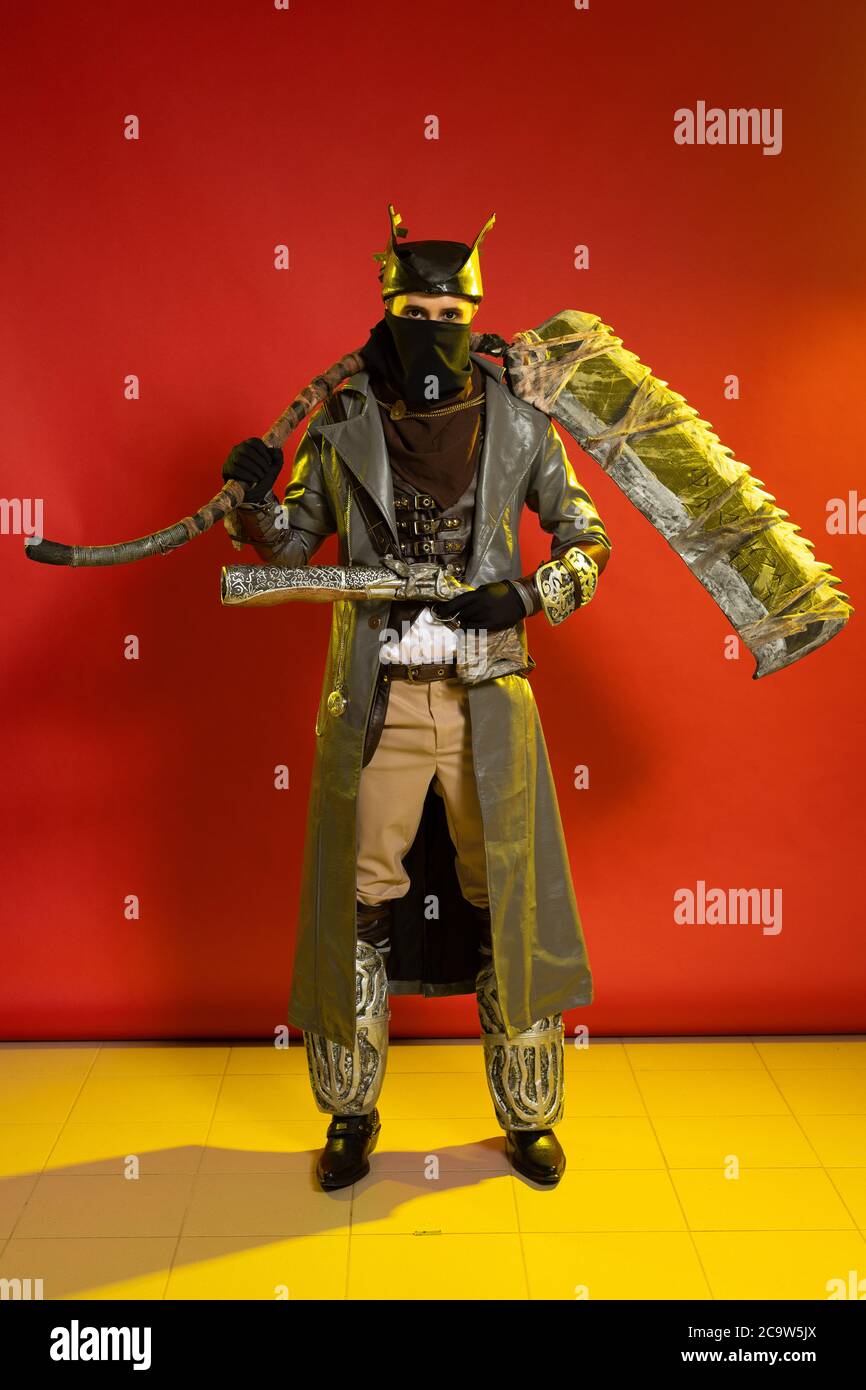 Actor a man in a mask and in costumes of fictional fantasy characters ...