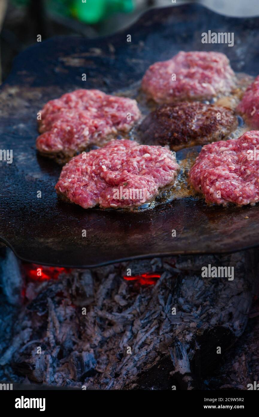 Burger Grilling on Fire.Homemade Hamburgers. Grill Meatballs. Making ...