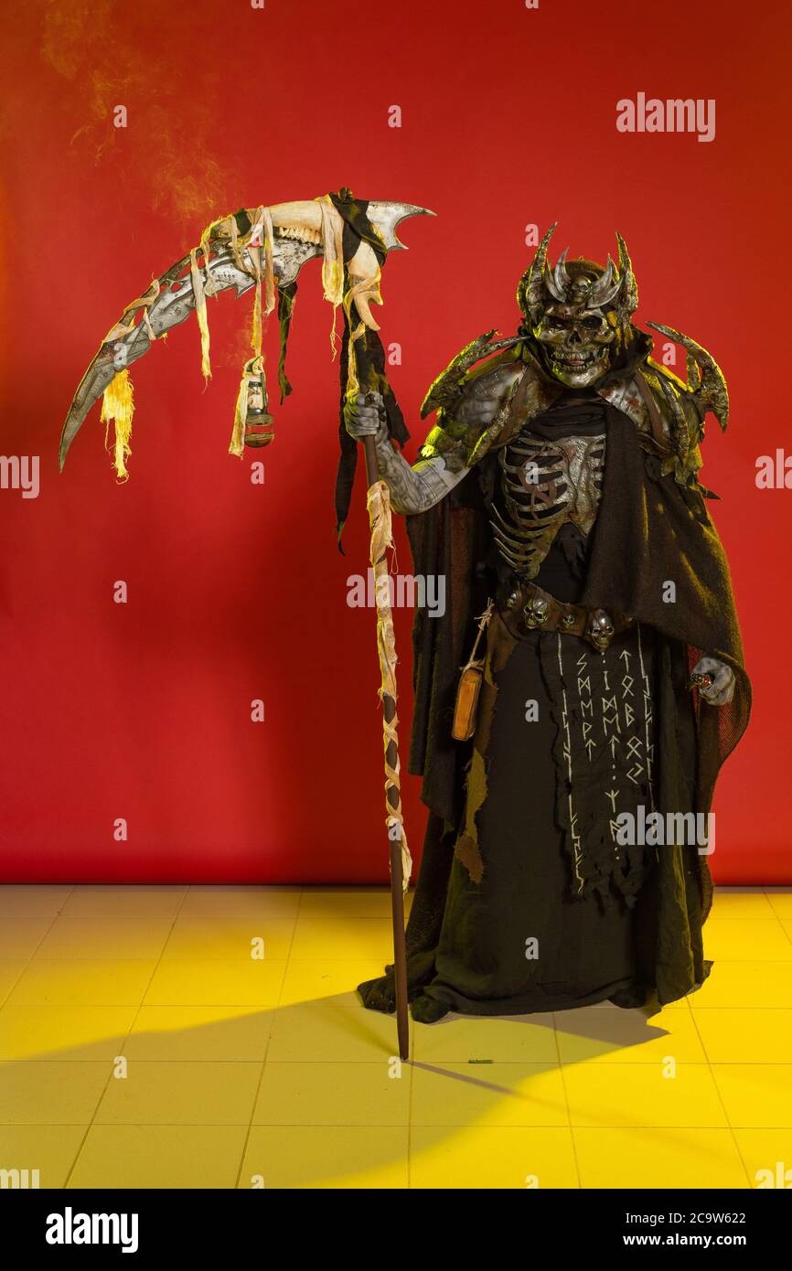 Actor a man in a mask and in costumes of fictional fantasy characters ...