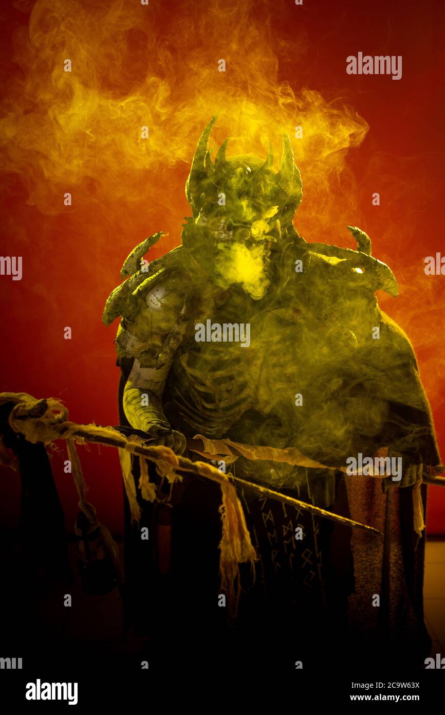 Actor a man in a mask and in costumes of fictional fantasy characters ...