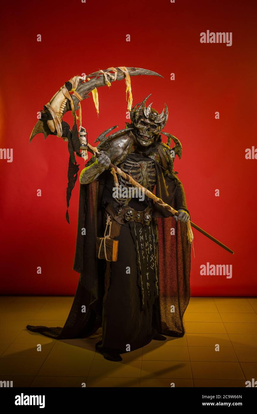 Actor a man in a mask and in costumes of fictional fantasy characters ...
