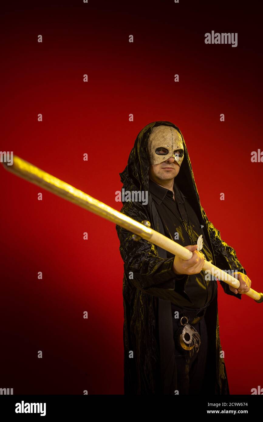 Actor a man in a mask and in costumes of fictional fantasy characters ...