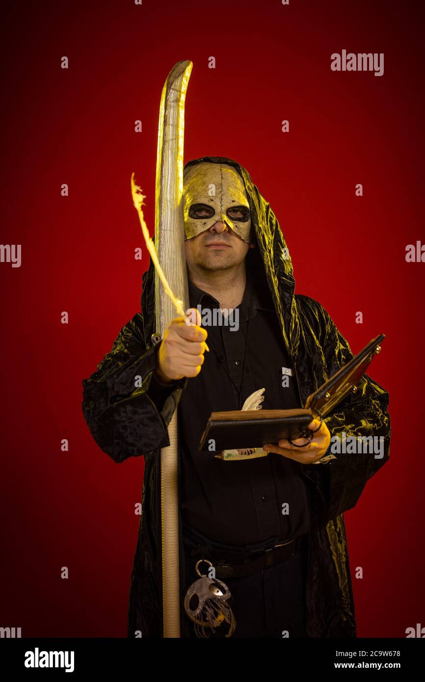 Actor a man in a mask and in costumes of fictional fantasy characters ...