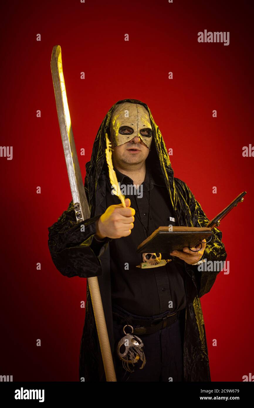 Actor a man in a mask and in costumes of fictional fantasy characters ...