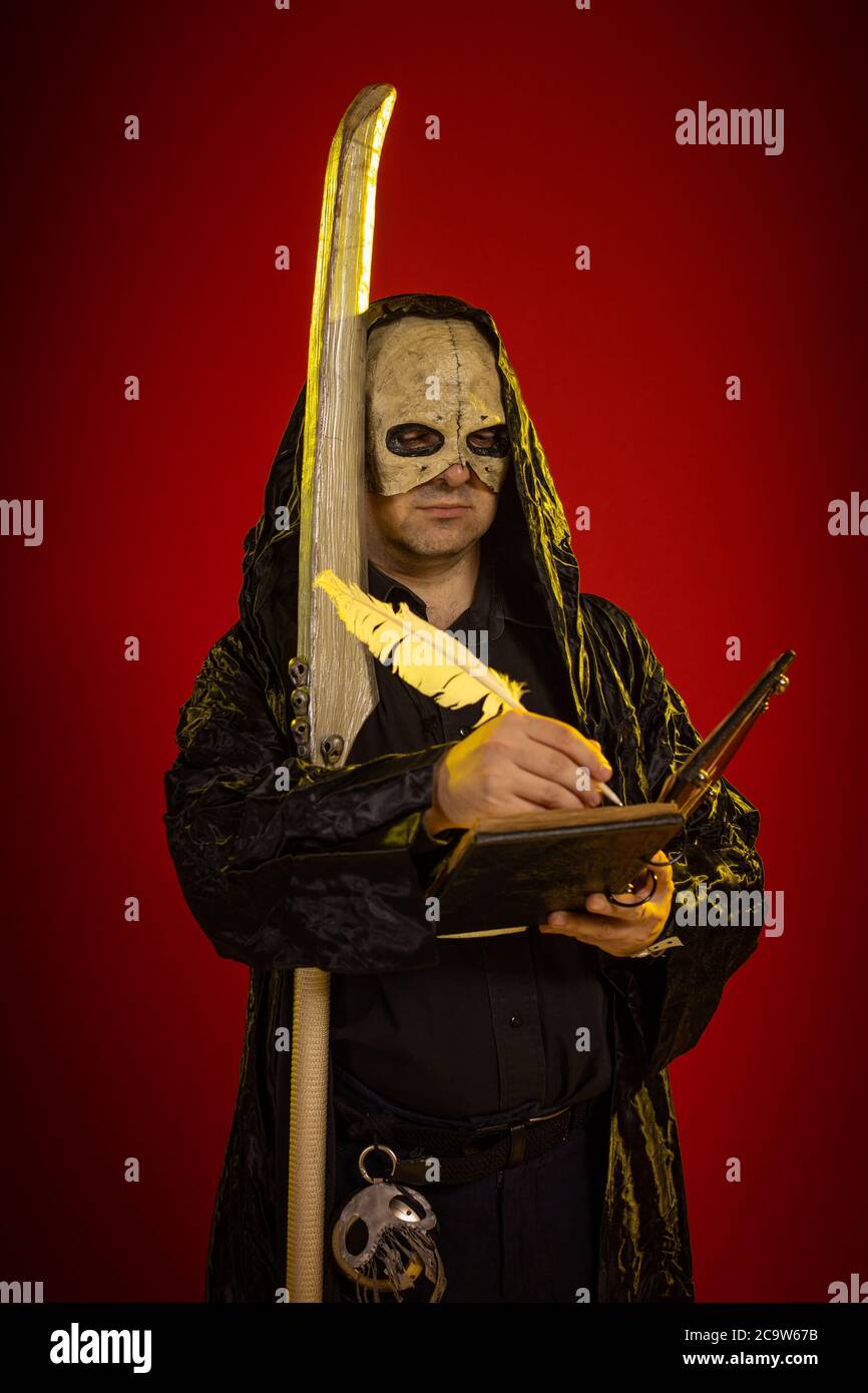Actor a man in a mask and in costumes of fictional fantasy characters ...