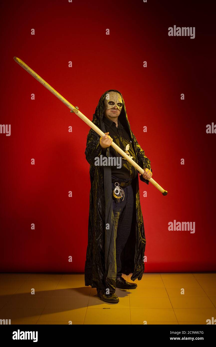 Actor a man in a mask and in costumes of fictional fantasy characters ...