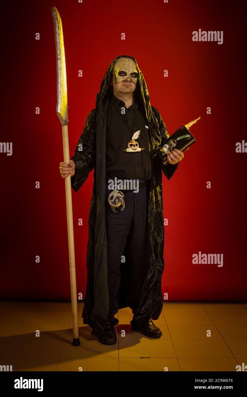 Actor a man in a mask and in costumes of fictional fantasy characters ...