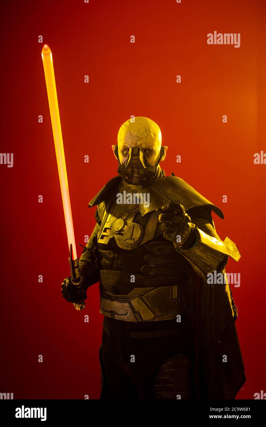 Actor a man in a mask and in costumes of fictional fantasy characters ...