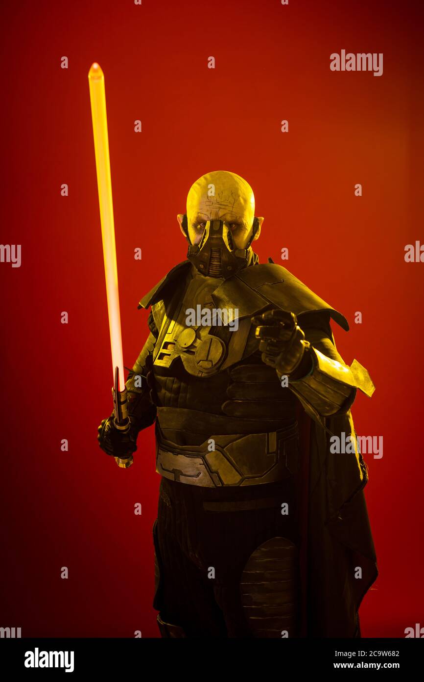 Actor a man in a mask and in costumes of fictional fantasy characters ...