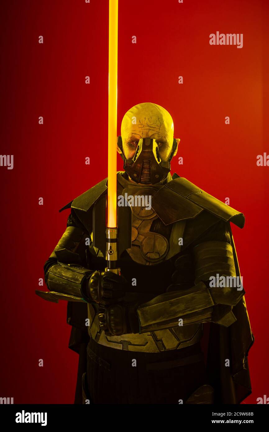Actor a man in a mask and in costumes of fictional fantasy characters ...