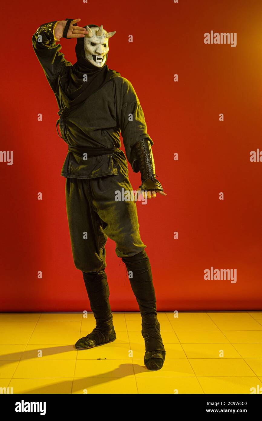 Actor a man in a mask and in costumes of fictional fantasy characters ...