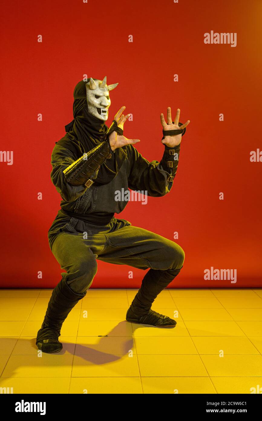Actor a man in a mask and in costumes of fictional fantasy characters ...