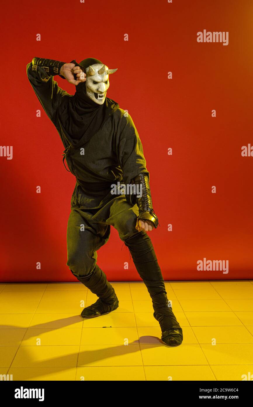 Actor a man in a mask and in costumes of fictional fantasy characters ...