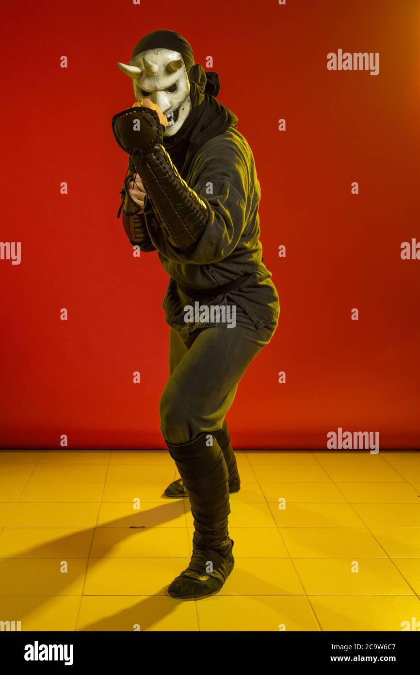 Actor a man in a mask and in costumes of fictional fantasy characters ...