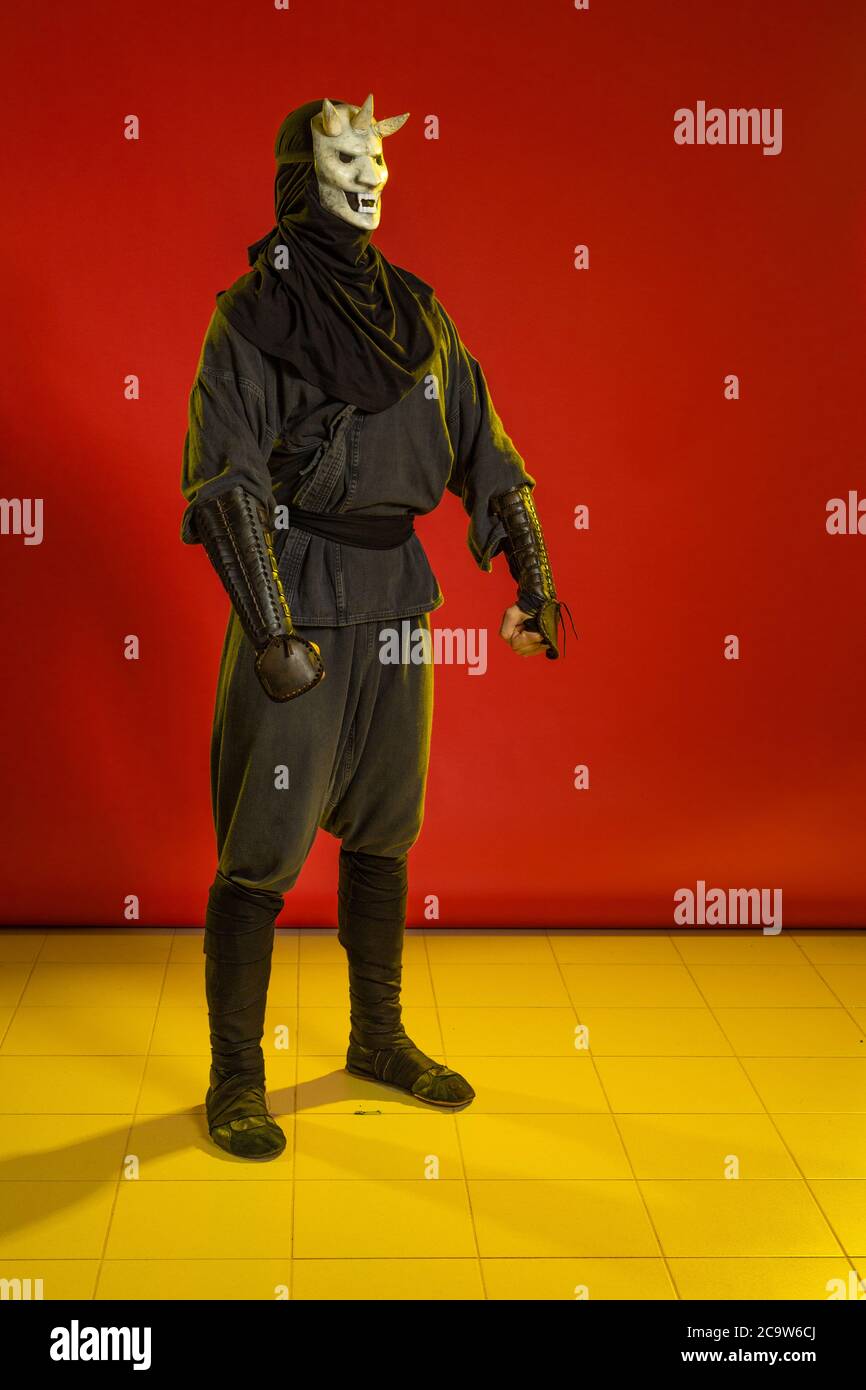 Actor a man in a mask and in costumes of fictional fantasy characters ...