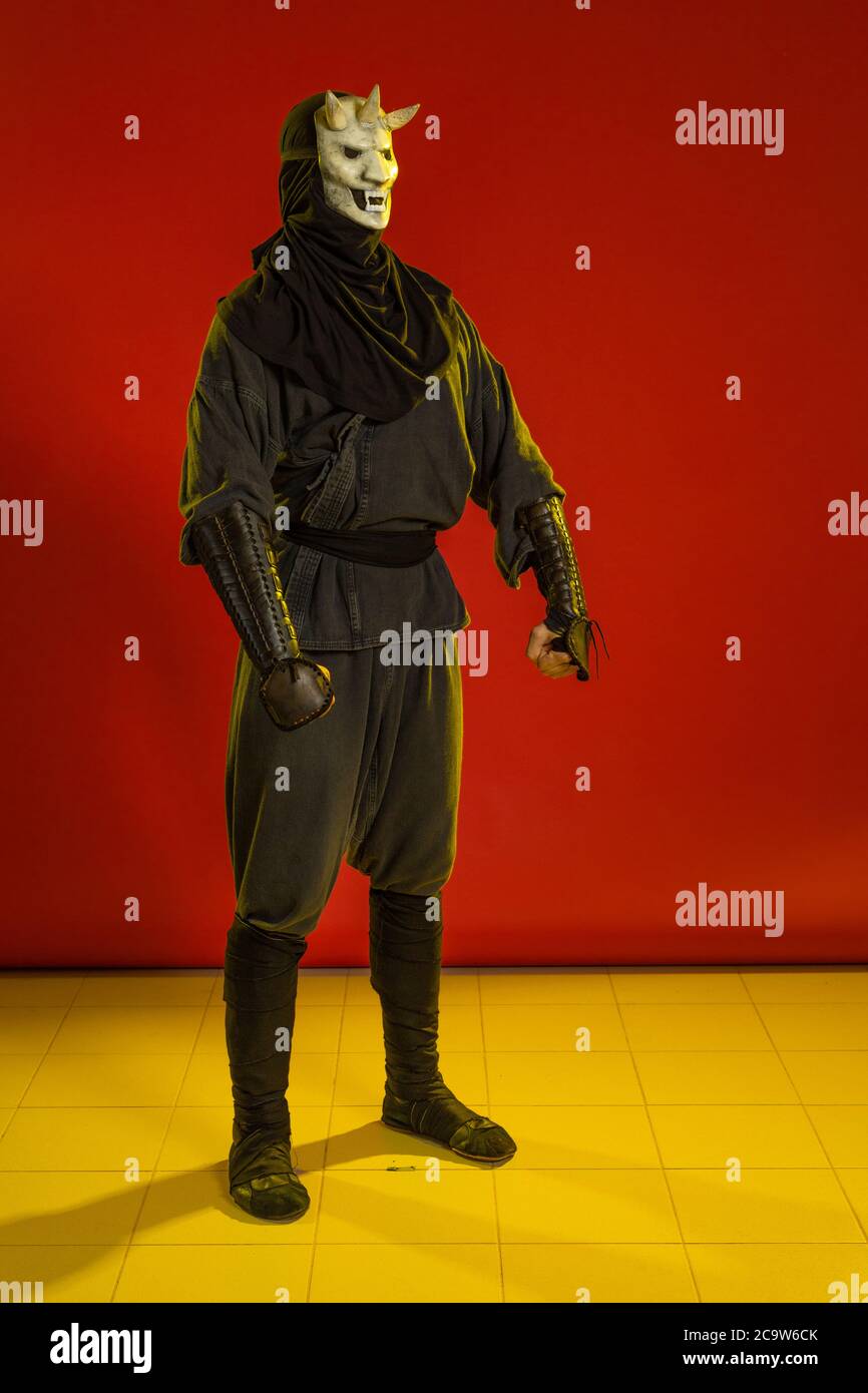 Actor a man in a mask and in costumes of fictional fantasy characters ...