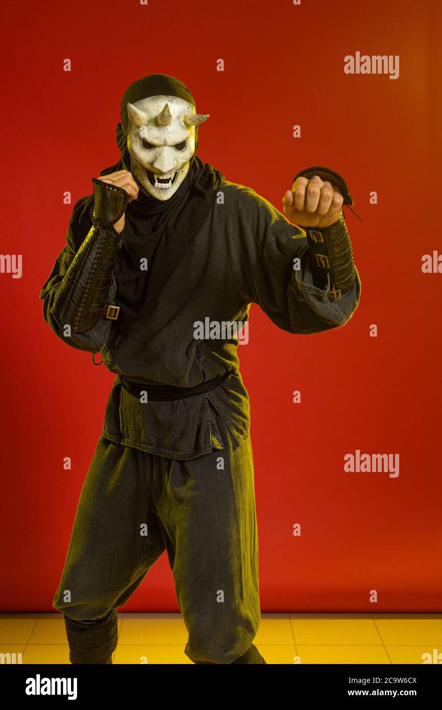 Actor a man in a mask and in costumes of fictional fantasy characters ...