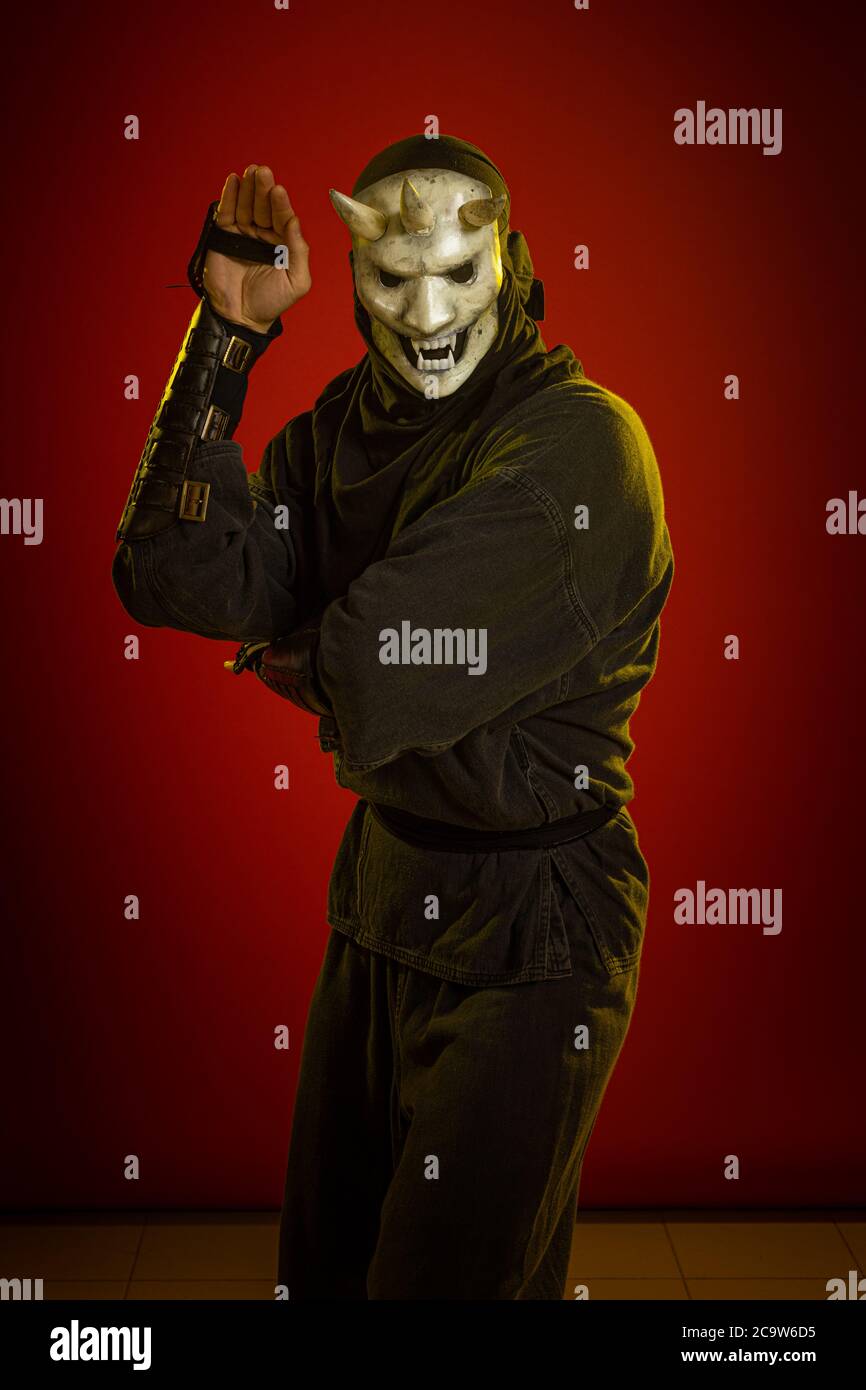 Actor a man in a mask and in costumes of fictional fantasy characters ...