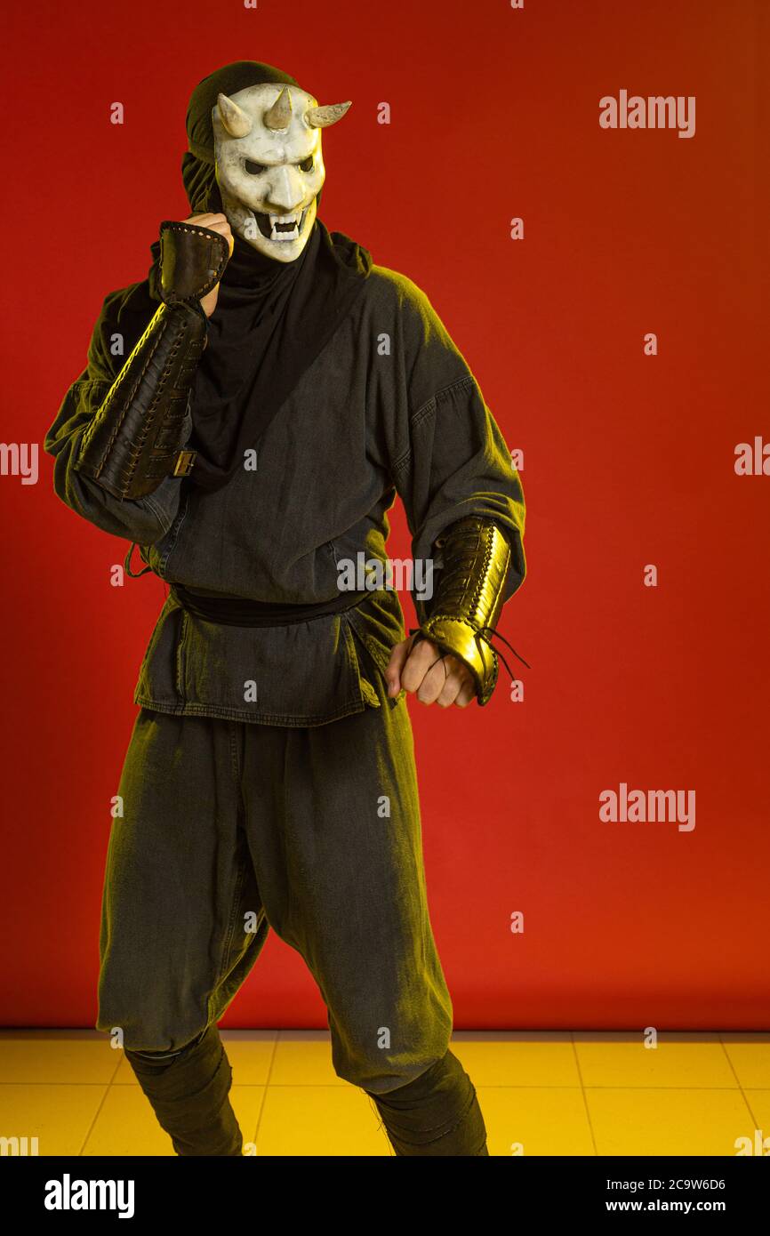 Actor a man in a mask and in costumes of fictional fantasy characters ...