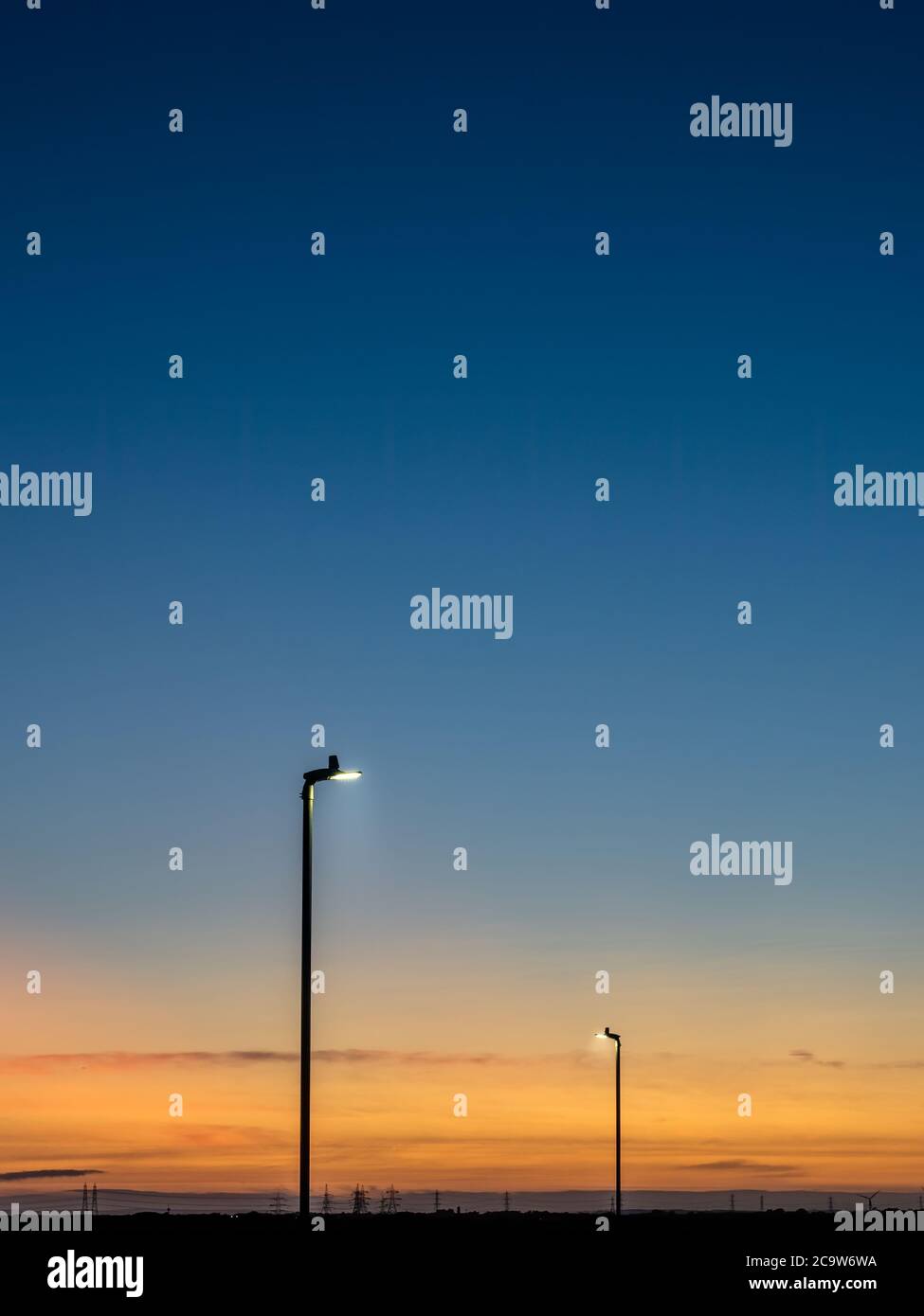 Street lights at dusk in a rural area Stock Photo - Alamy