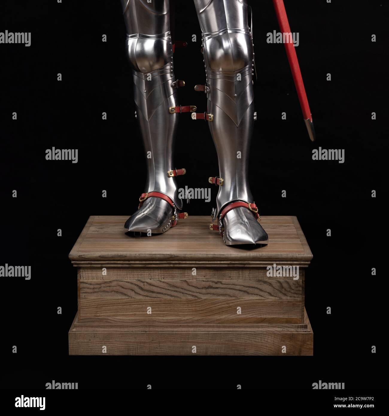 Mannequin man with a beard in a helmet and armor of a knight posing on ...