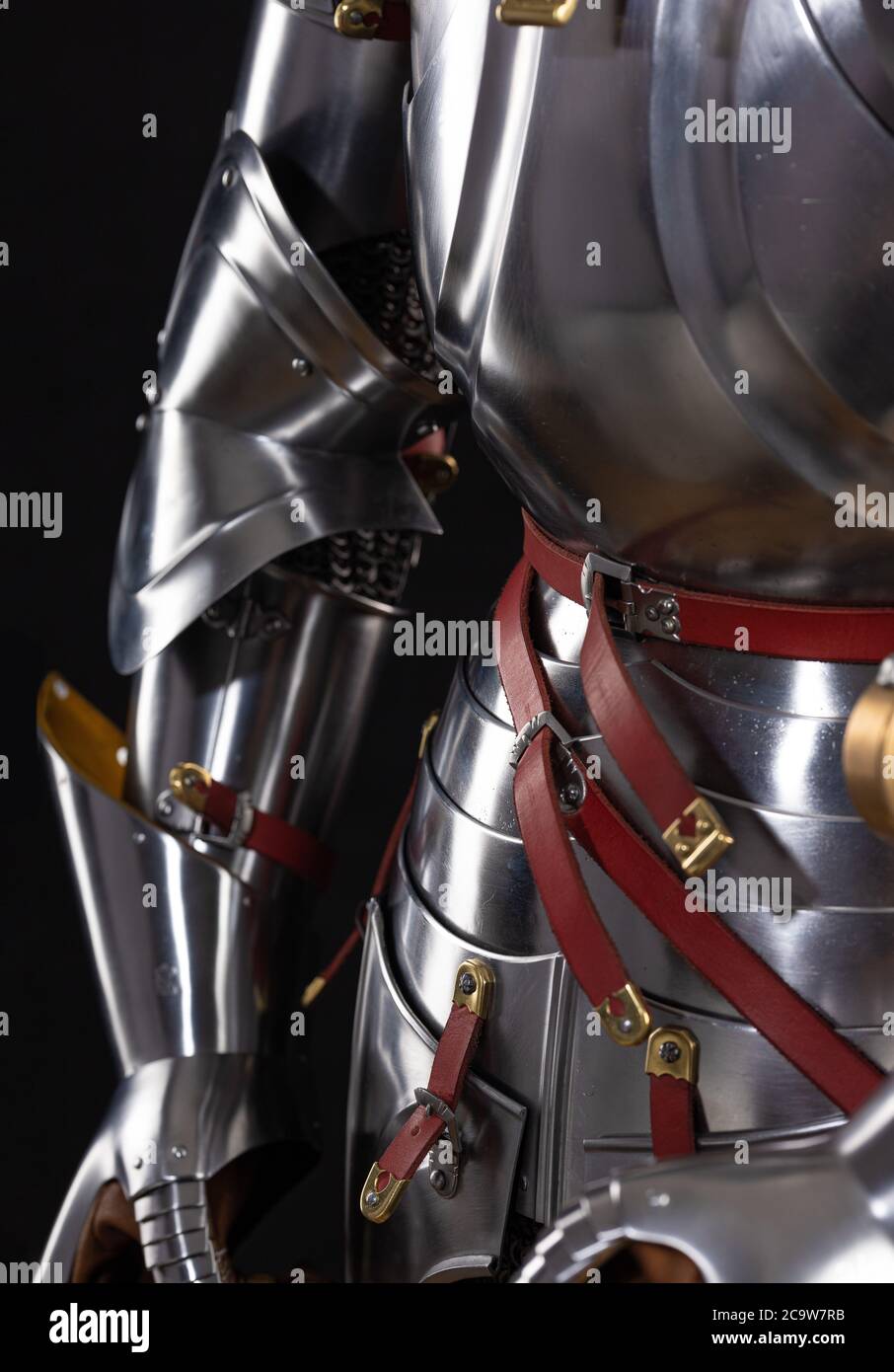 Mannequin man with a beard in a helmet and armor of a knight posing on ...