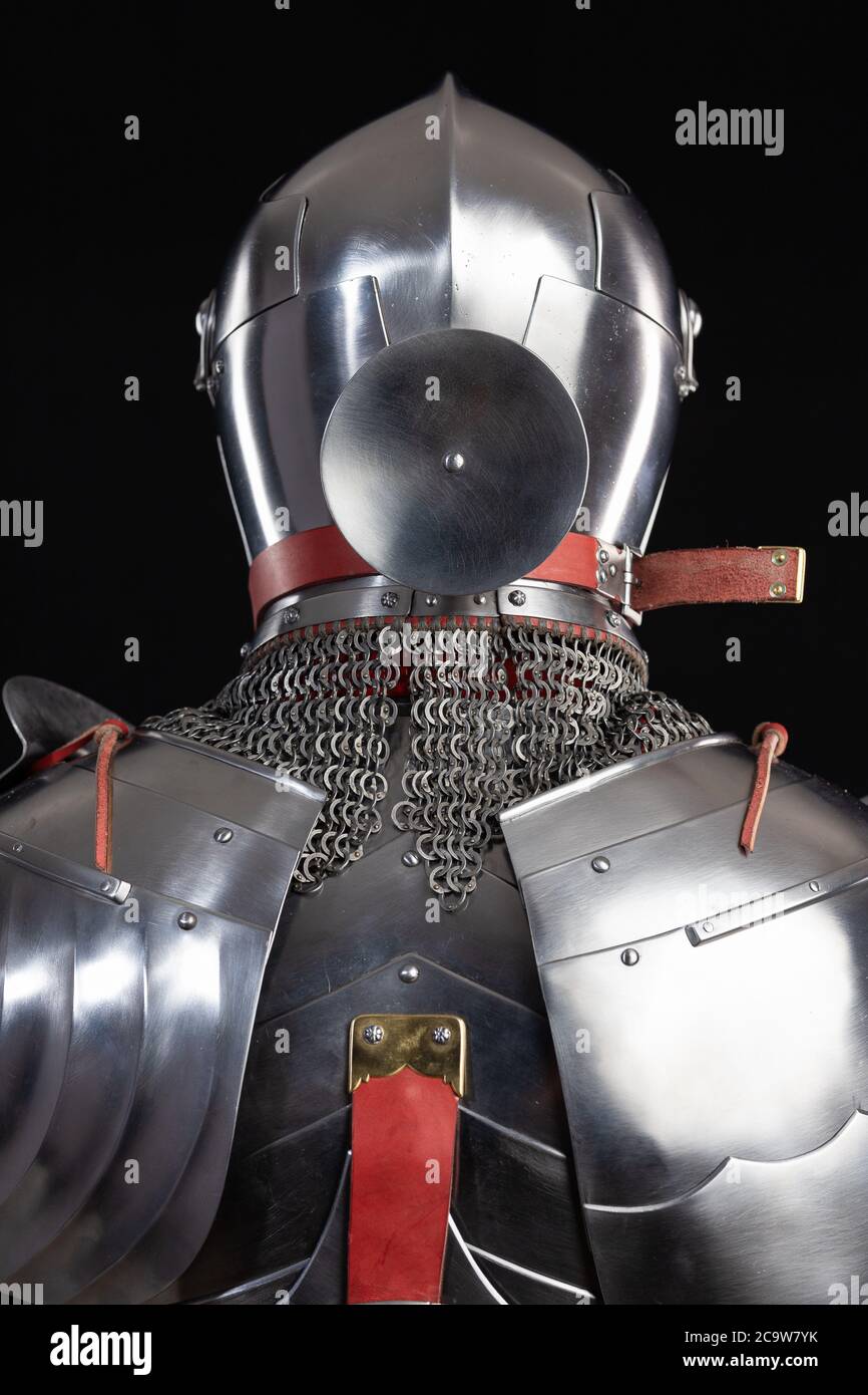 Mannequin man with a beard in a helmet and armor of a knight posing on ...