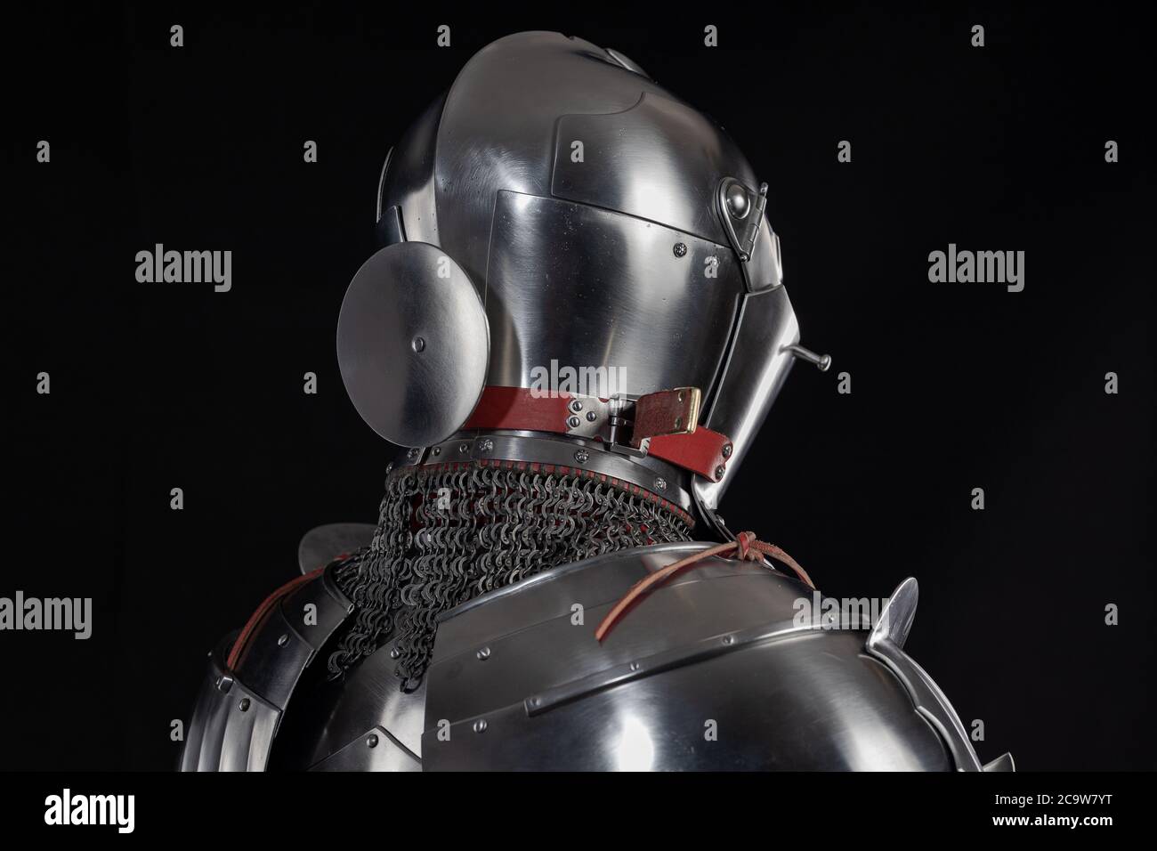 Mannequin man with a beard in a helmet and armor of a knight posing on ...