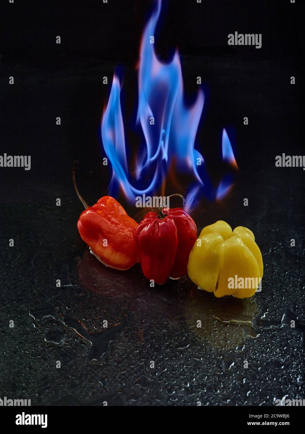 Scotch bonnet water droplets and flames food still life portrait Stock ...