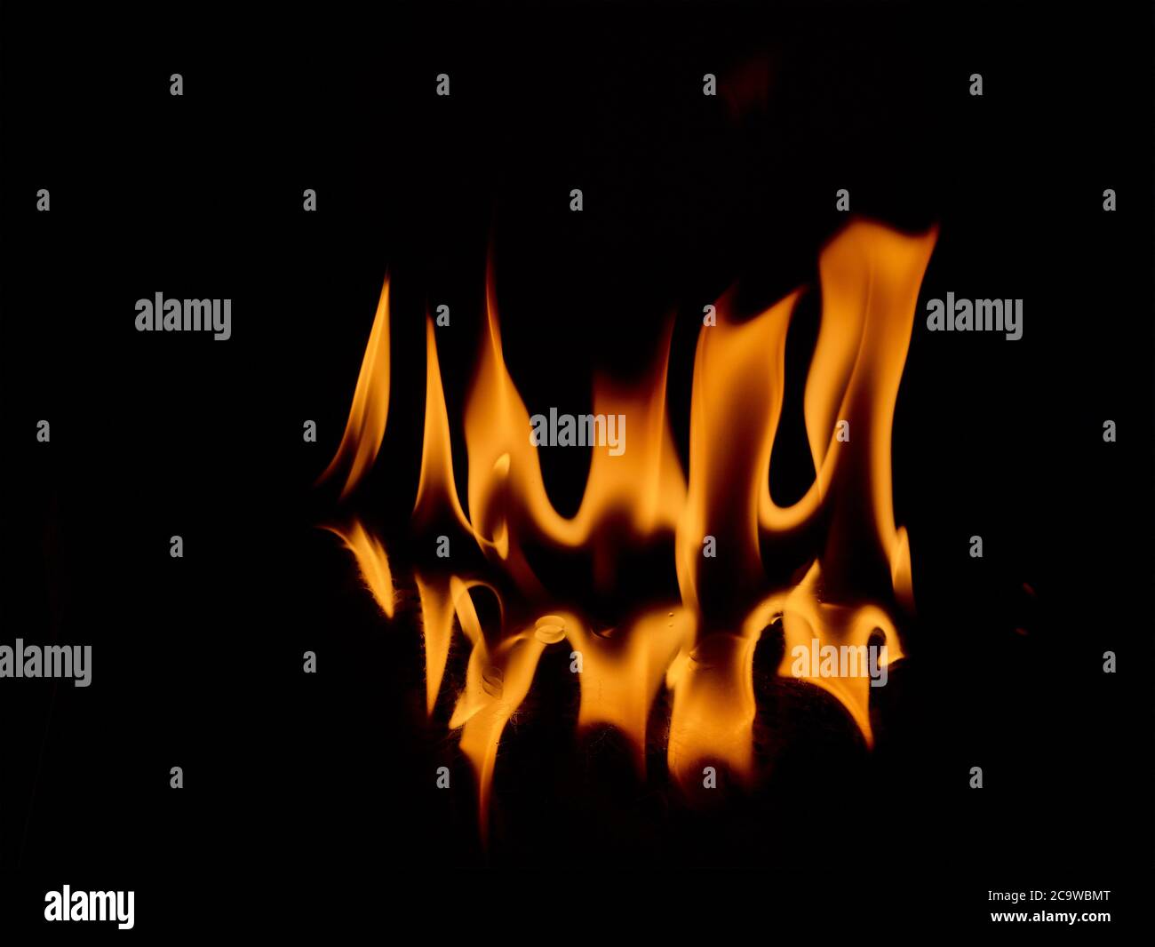 Fire, flames against a black background with reflection Stock Photo - Alamy