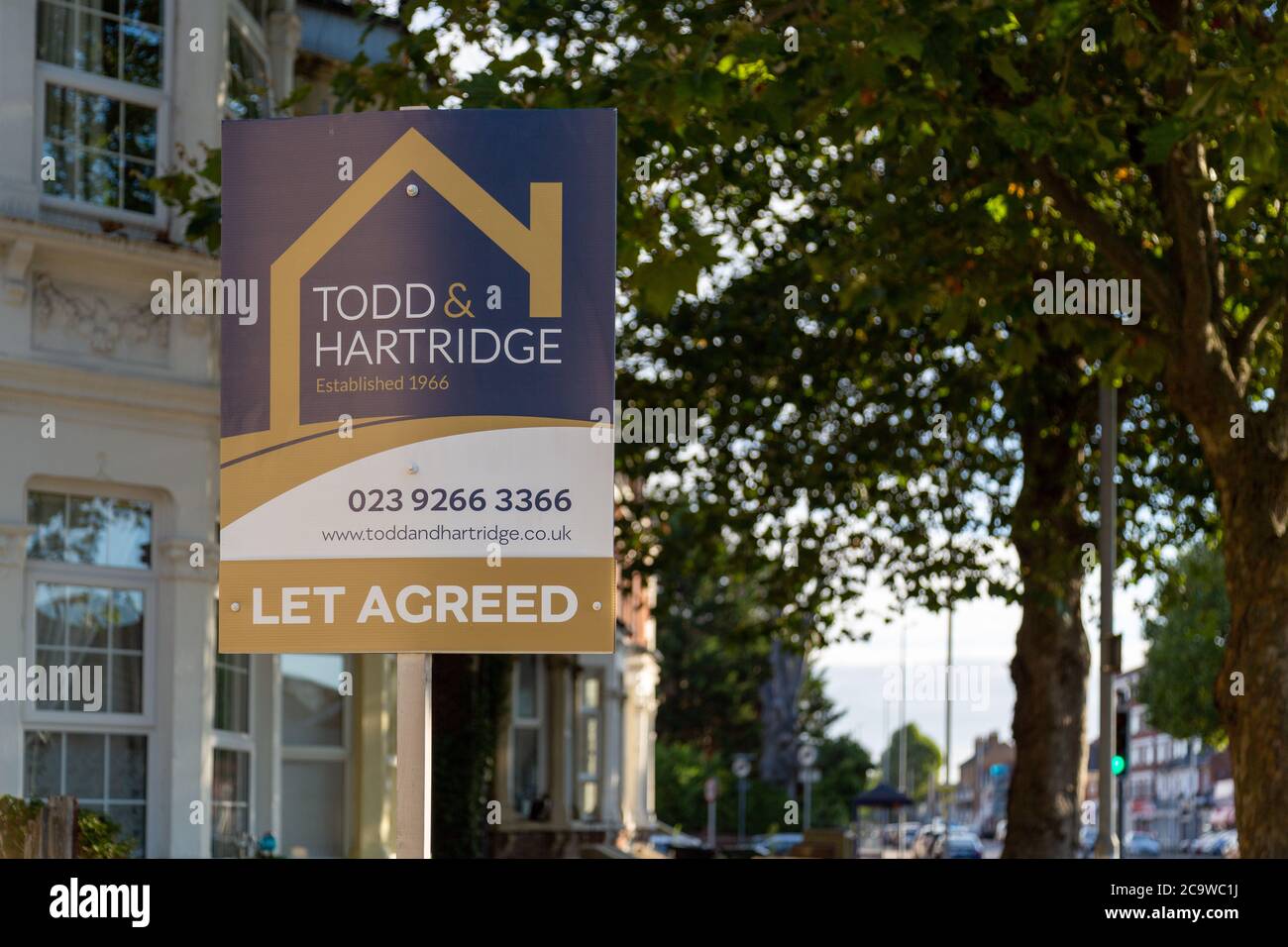 A let agreed sign outside a house with the logo of Todd and Hartridge ...