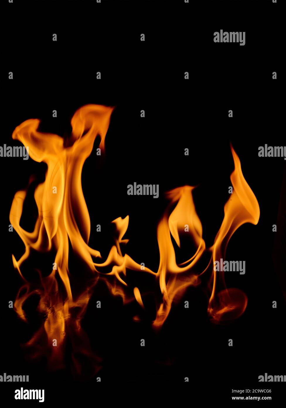 Fire, flames against a black background with reflection Stock Photo - Alamy