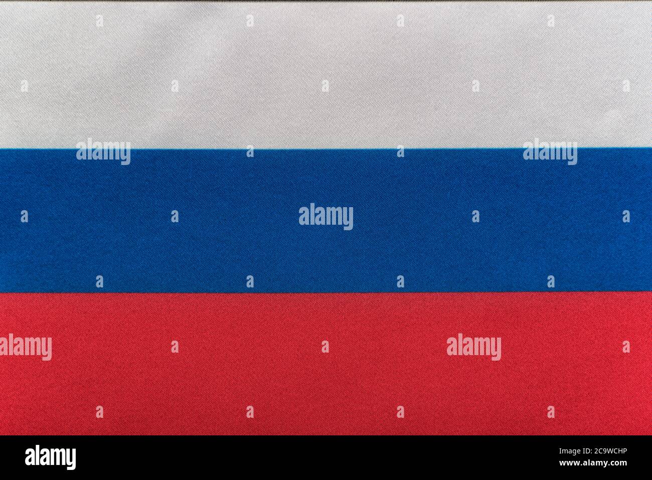 National emblem of Russian Federation. Flag of Russia on close up ...