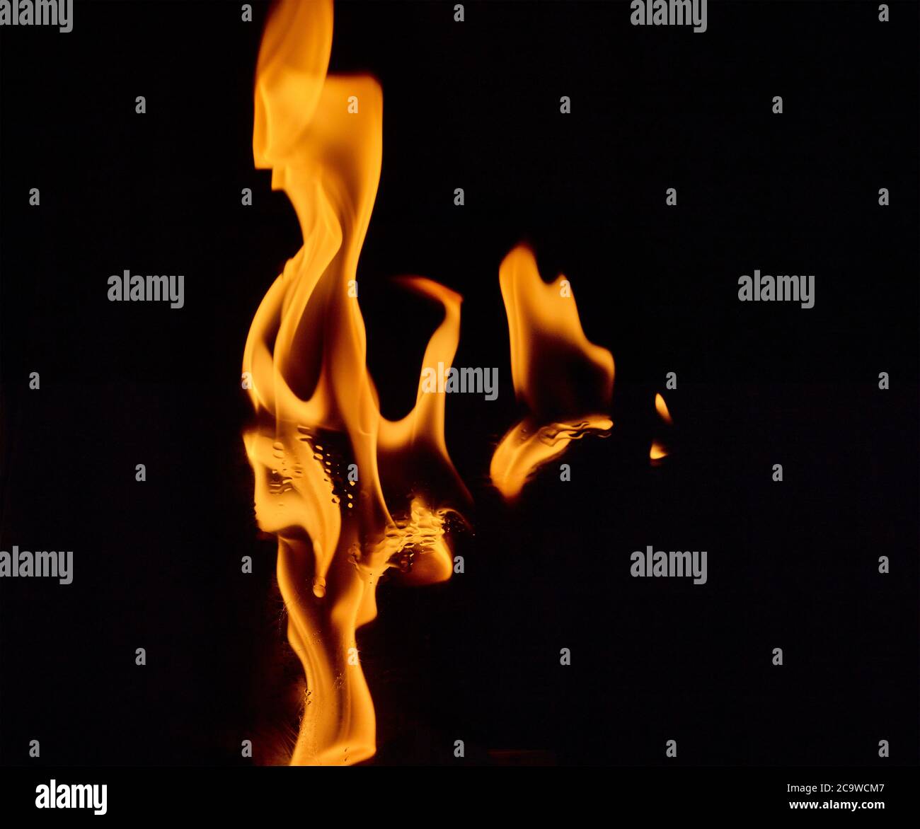 Fire, flames against a black background with reflection Stock Photo - Alamy