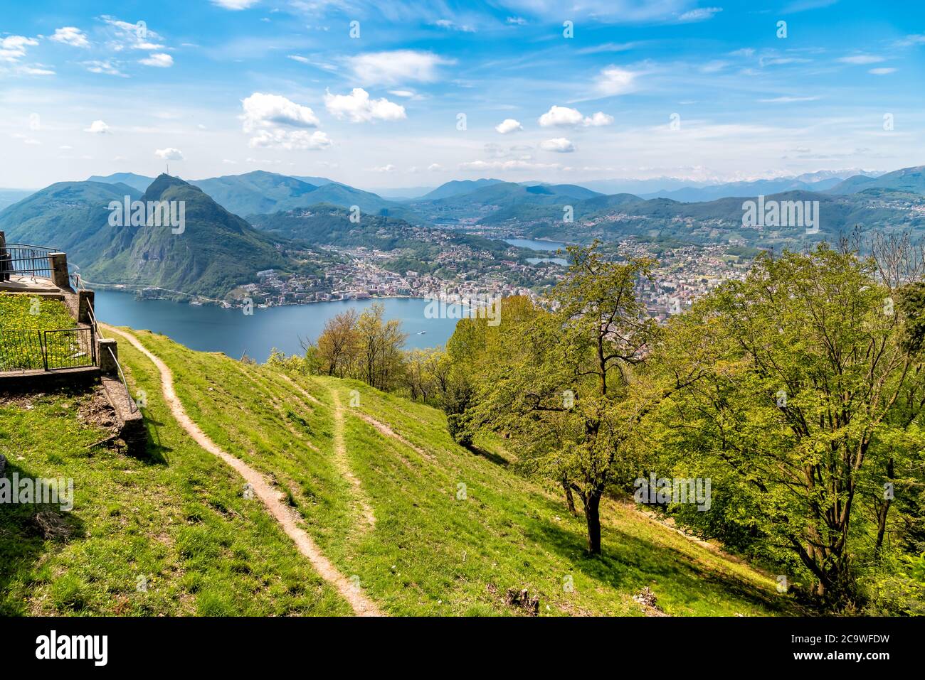 Scenic view of lake Lugano with Monte San Salvatore and Lugano town ...