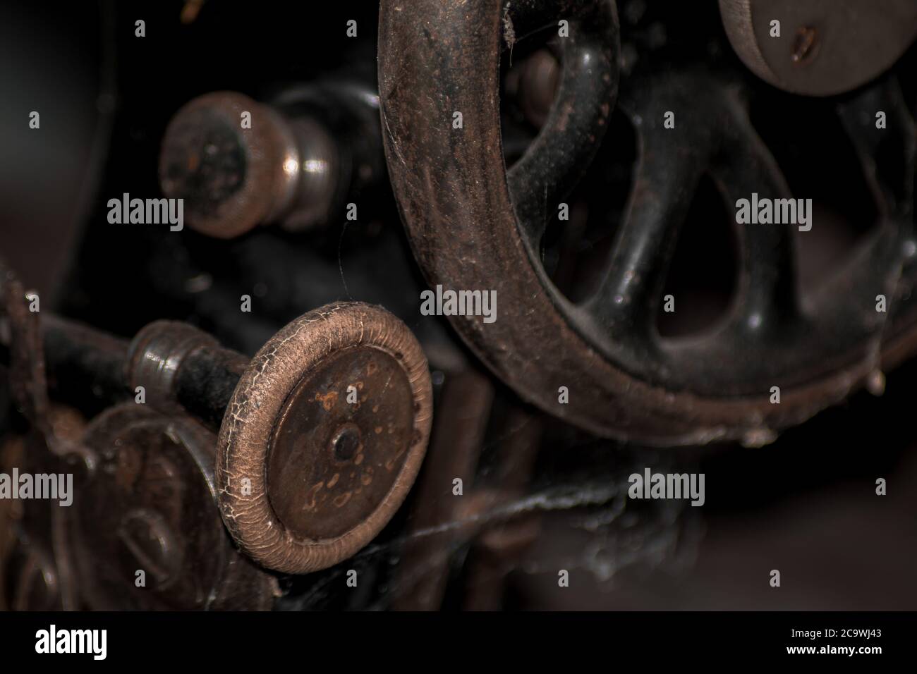 Closeup of the wheel on an old vintage sewing machine Stock Photo - Alamy