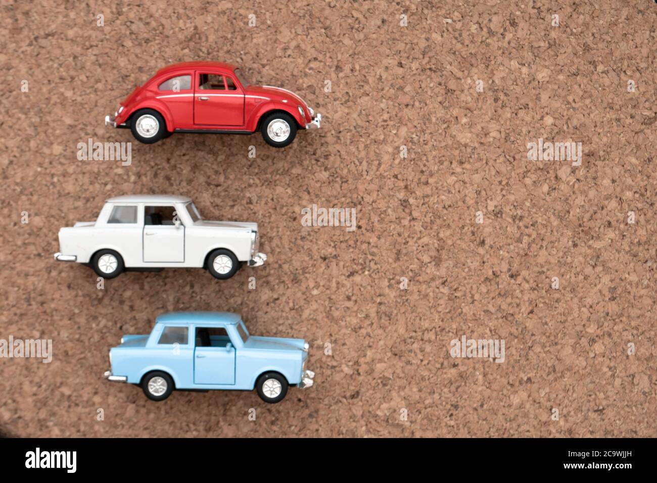 Flat lay of different nostalgic toy cars in various colors Stock Photo ...