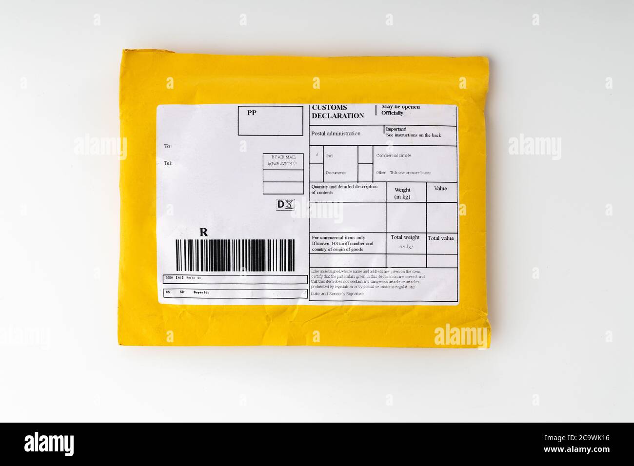 Small paper post packet isolated on the white background Stock Photo ...