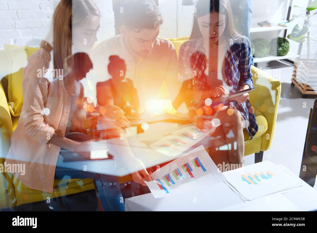 Business people that work together in office with statistics. Concept ...