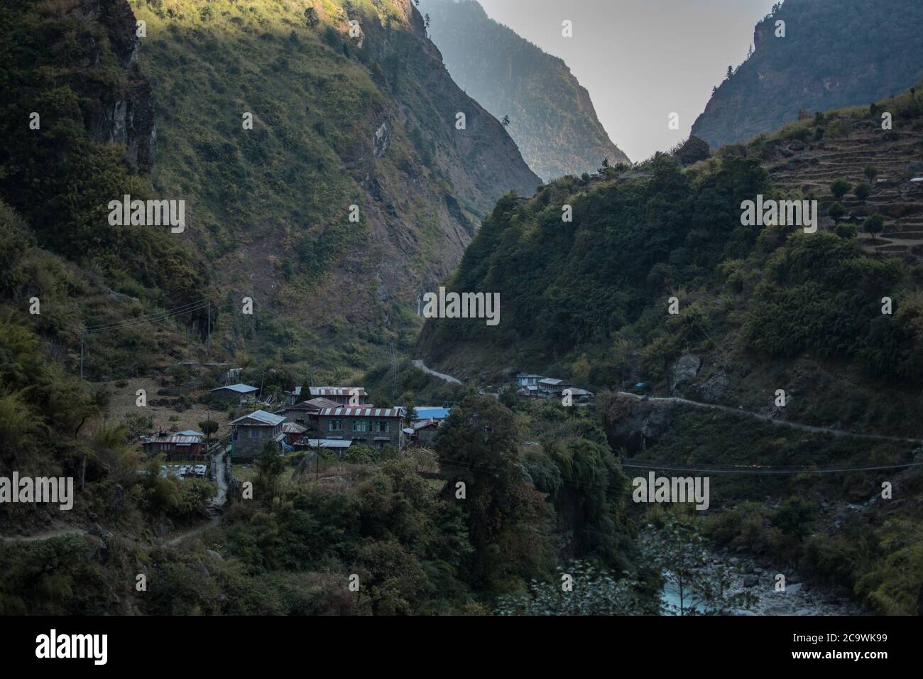Nepalese mountain village by the Marshyangdi river, Annapurna circuit ...